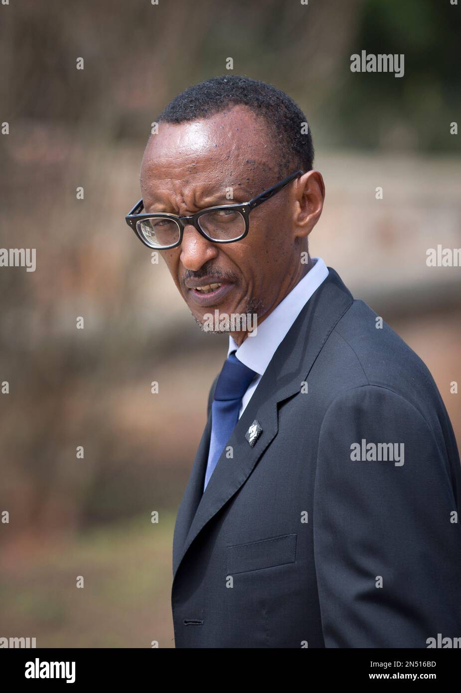 Rwandan President Paul Kagame arrives to light a memorial flame at a ...