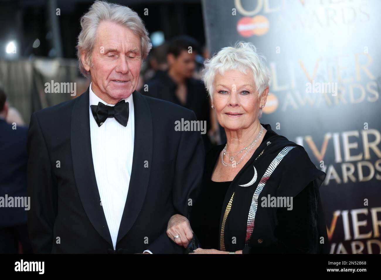 David Mills and Judi Dench arrives for the Olivier Awards at the Royal ...