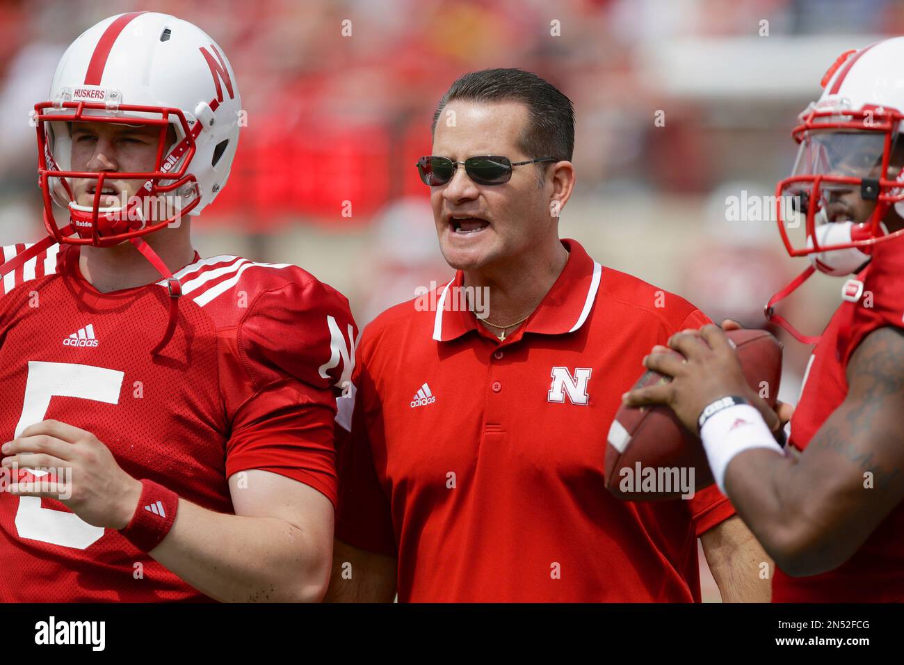 Offensive coordinator and quarterbacks coach Tim Beck stands between ...