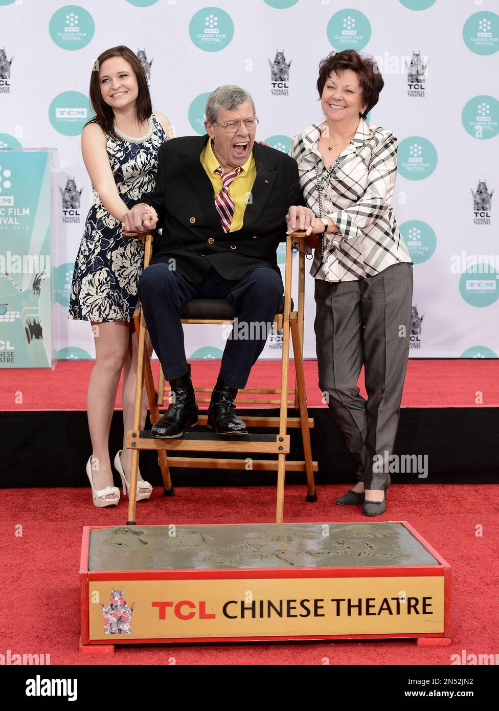 Actor and comedian Jerry Lewis, center, his wife, SanDee Pitnick, right ...