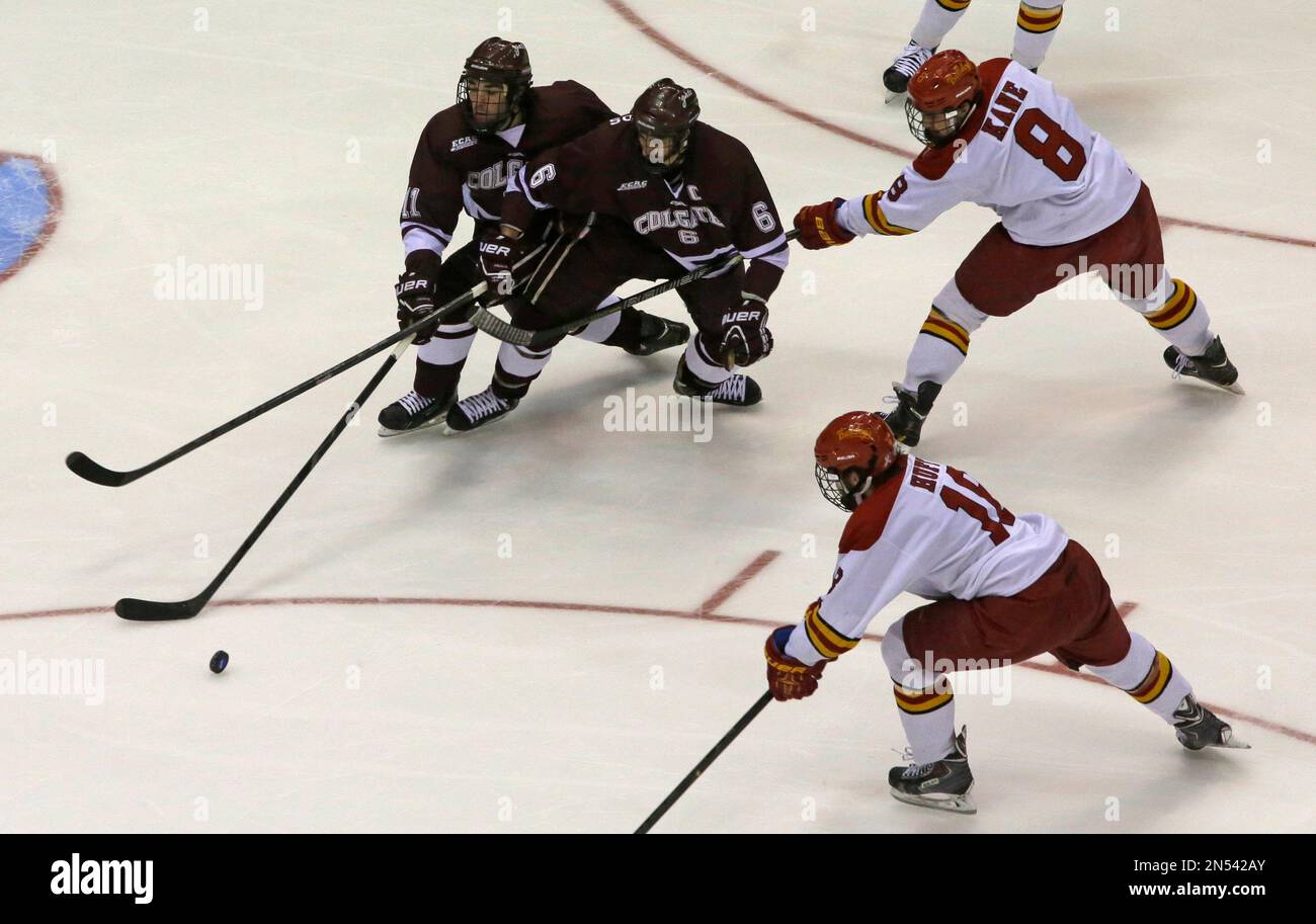 Ferris State forward Andy Huff (18) and forward Cory Kane (8) chase a ...