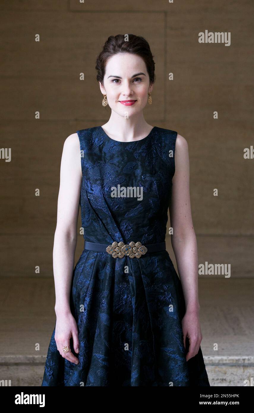 British Actress Michelle Dockery poses for photographers as she arrives ...