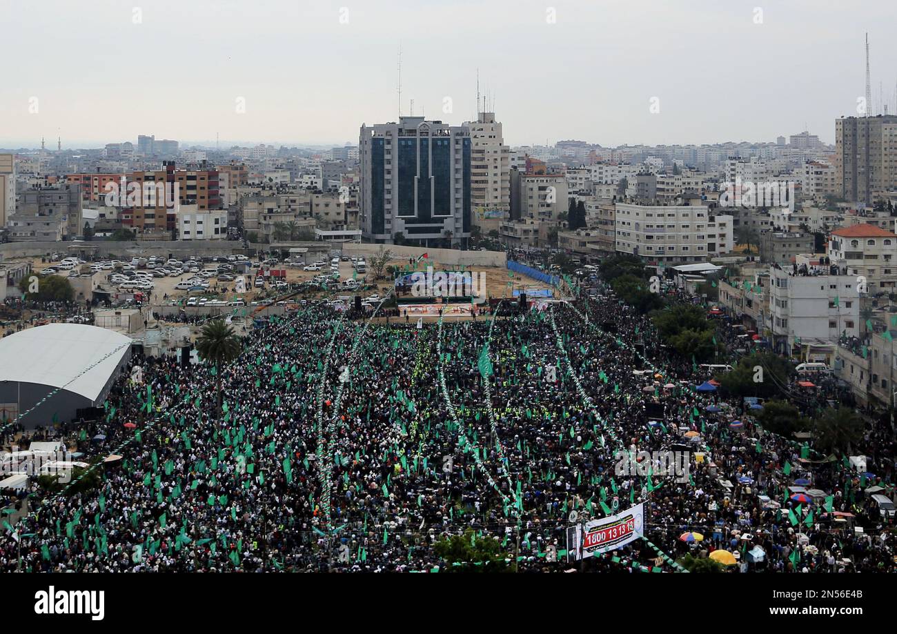 Tens of thousands of Hamas supporters attend a rally to commemorate the ...