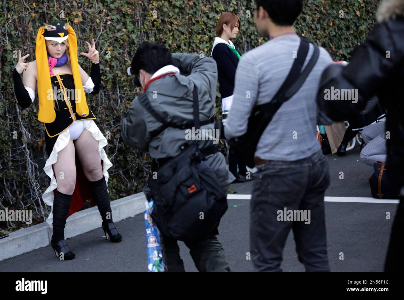 A foreign costume player, or cosplayer, poses for anime fans during ...