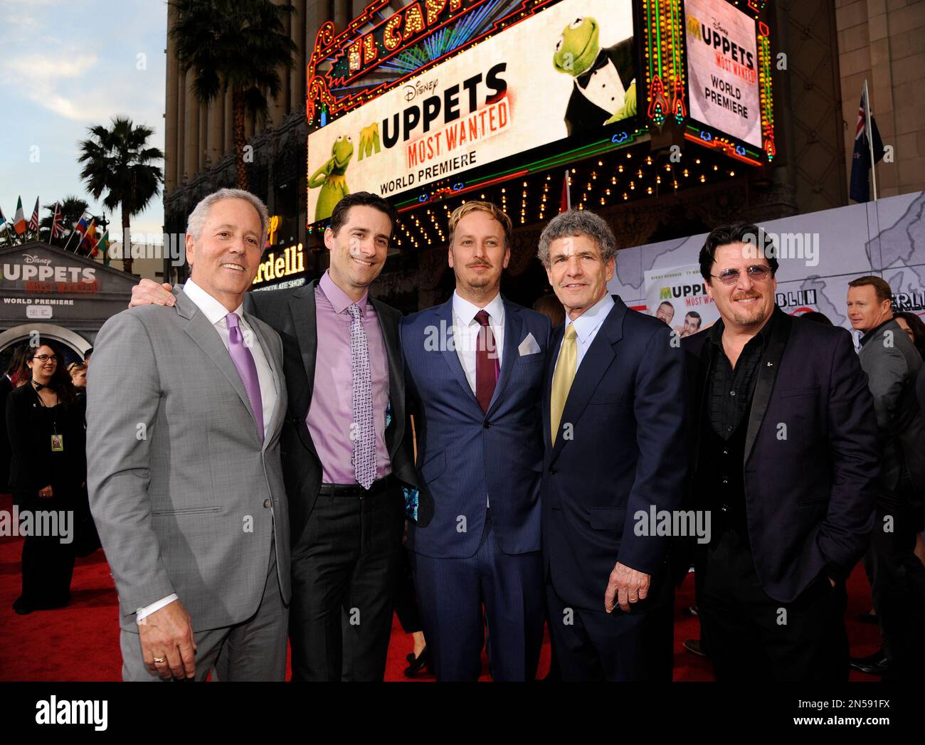 "Muppets Most Wanted" director/co-writer James Bobin, center, poses ...