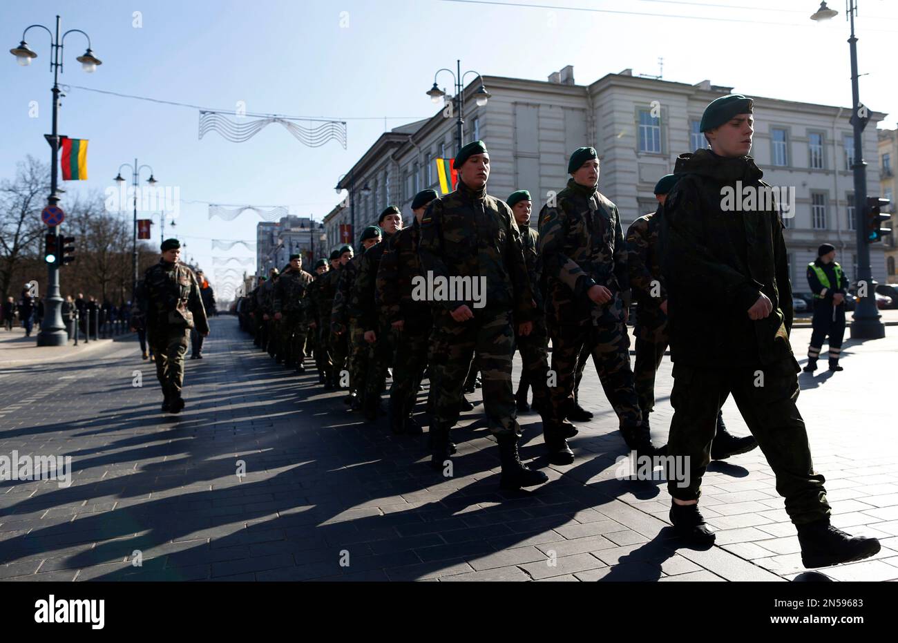 Lithuanian soldiers march during a celebration of Lithuania's ...