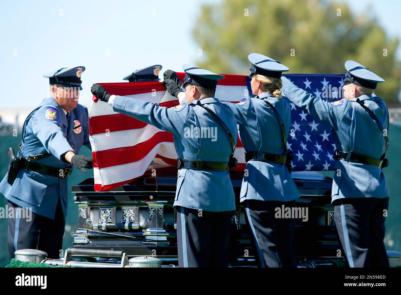 Phoenix Police Honor Guard folds the American Flag as Phoenix Police ...
