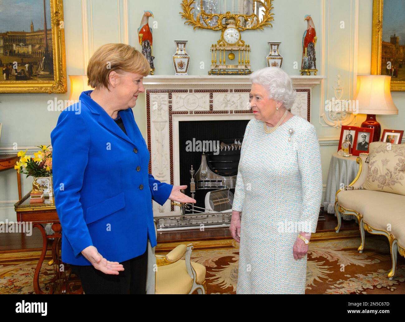 Britain's Queen Elizabeth II, right, meets German Chancellor Angela ...