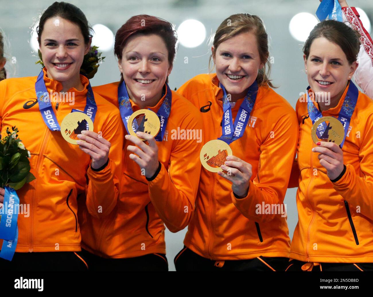 Gold medallists from team Netherlands, left to right, Marrit Leenstra ...