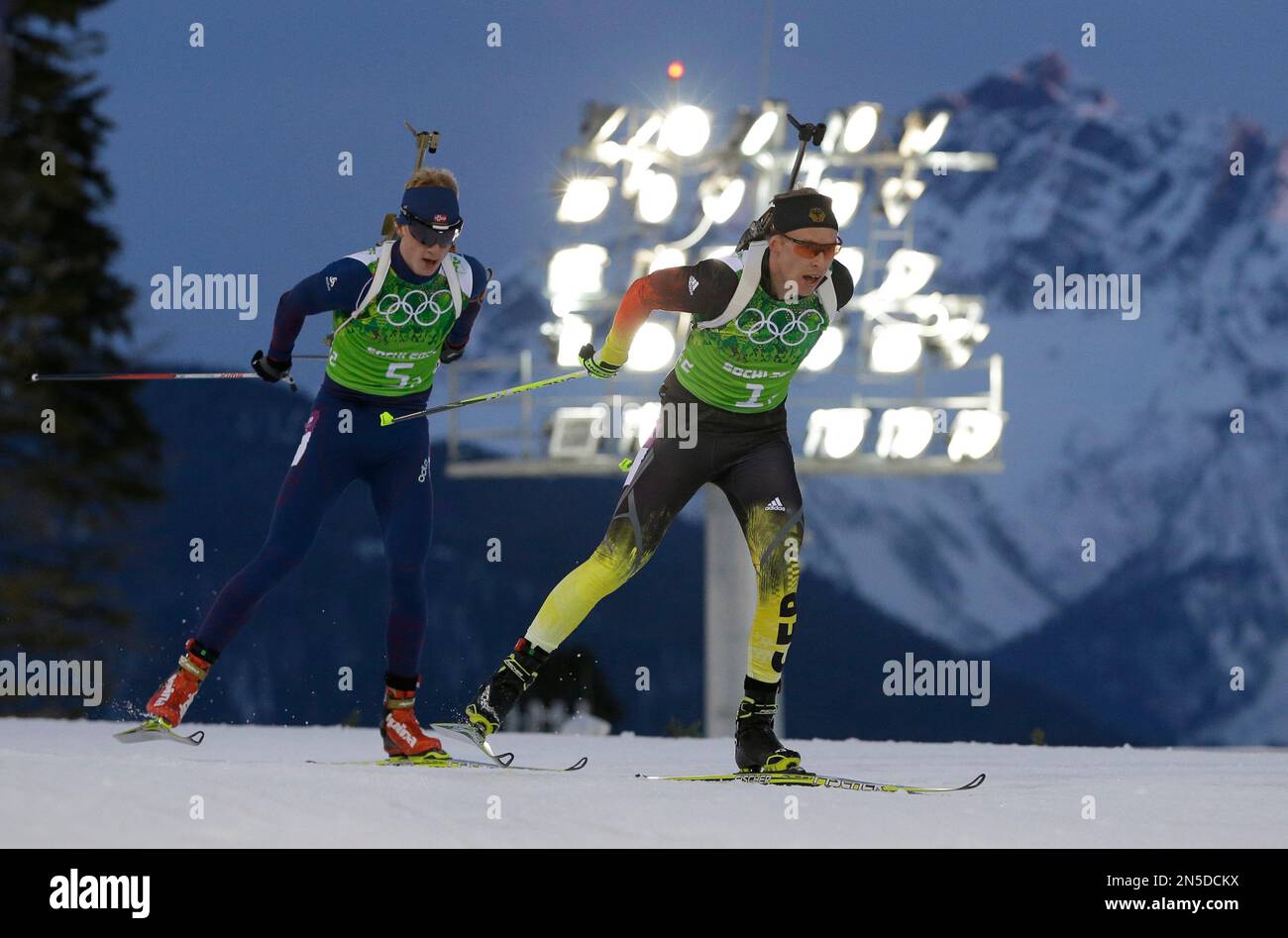 Norway's Johannes Thingnes Boe, left, and Germany's Daniel Boehm ...