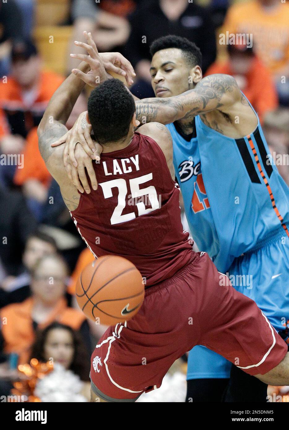 Oregon State forward Eric Moreland, right, fouls Washington State guard ...