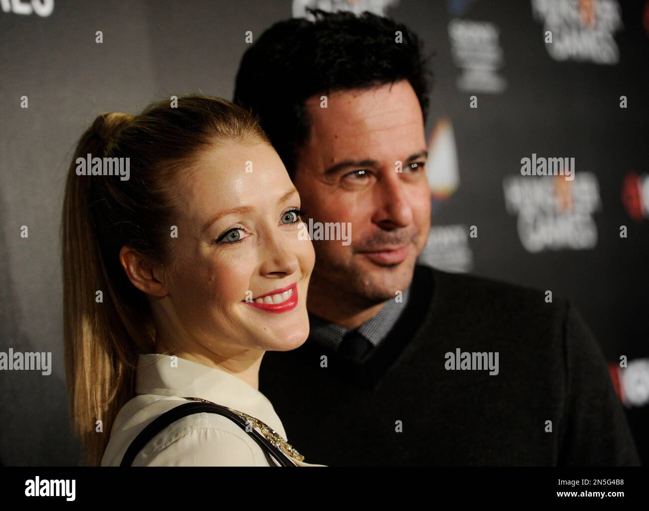 Actress Jennifer Finnigan poses with her husband Jonathan Silverman, a ...