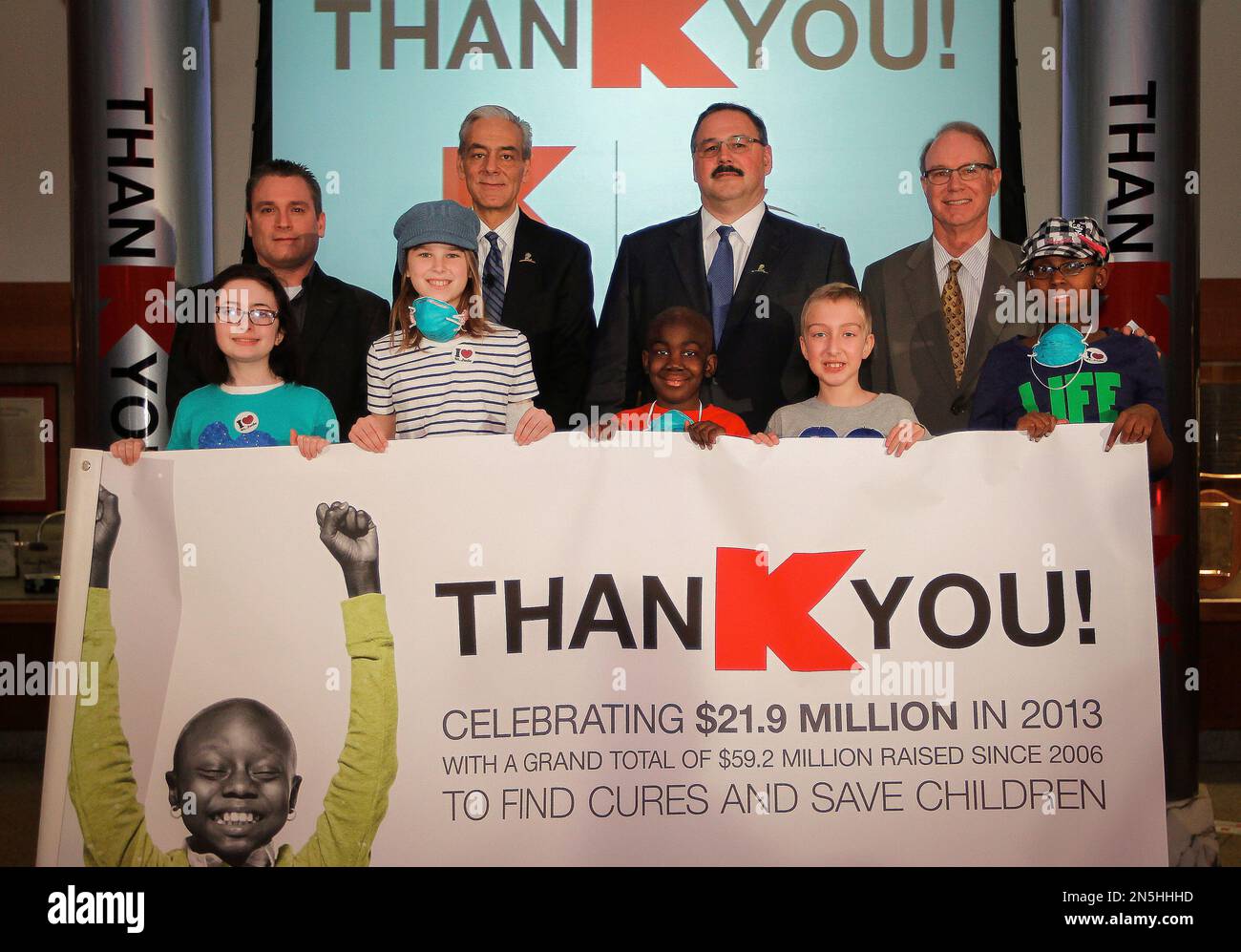 Tim Austin, senior vice president of Kmart retail, back from left ...