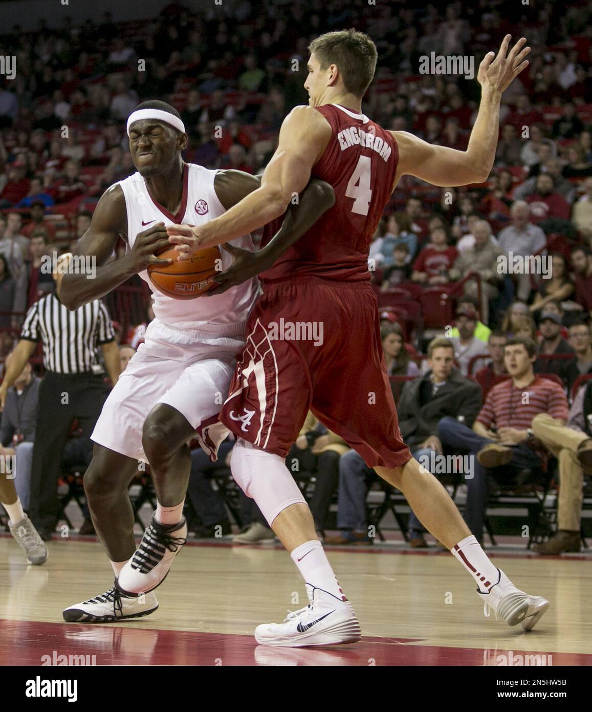 Arkansas forward Bobby Portis, left, drives to the basket against ...