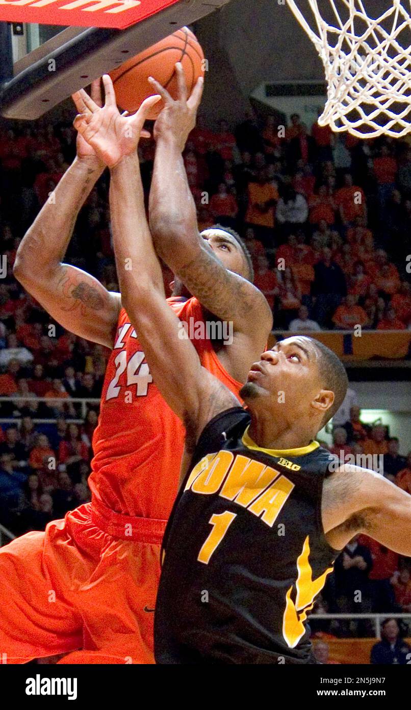 Illinois' Rayvonte Rice (24) and Iowa's forward Melsahn Basabe (1 ...