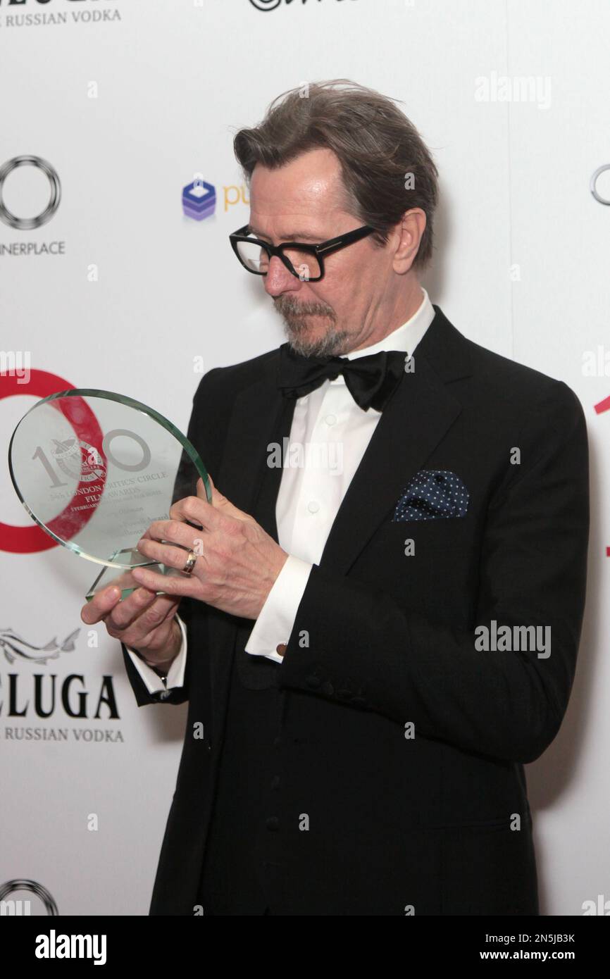 British actor Gary Oldman hold his award Dilys Powell Award for ...