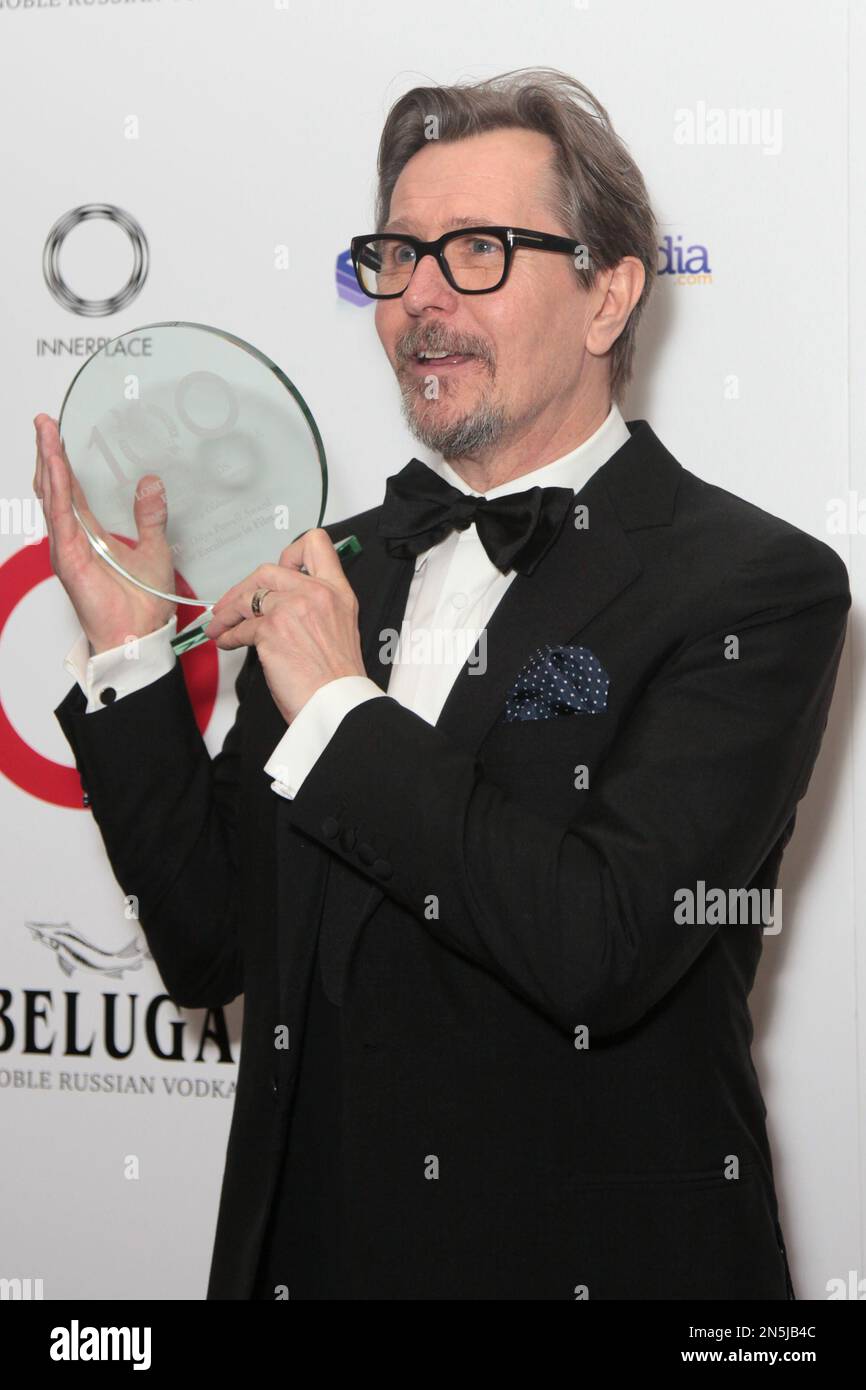 British actor Gary Oldman hold his award Dilys Powell Award for ...