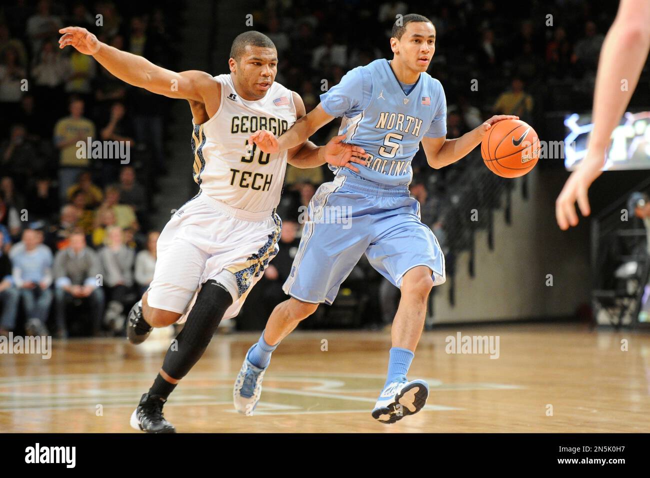 Georgia Tech guard Corey Heyward (30) and North Carolina guard Marcus ...