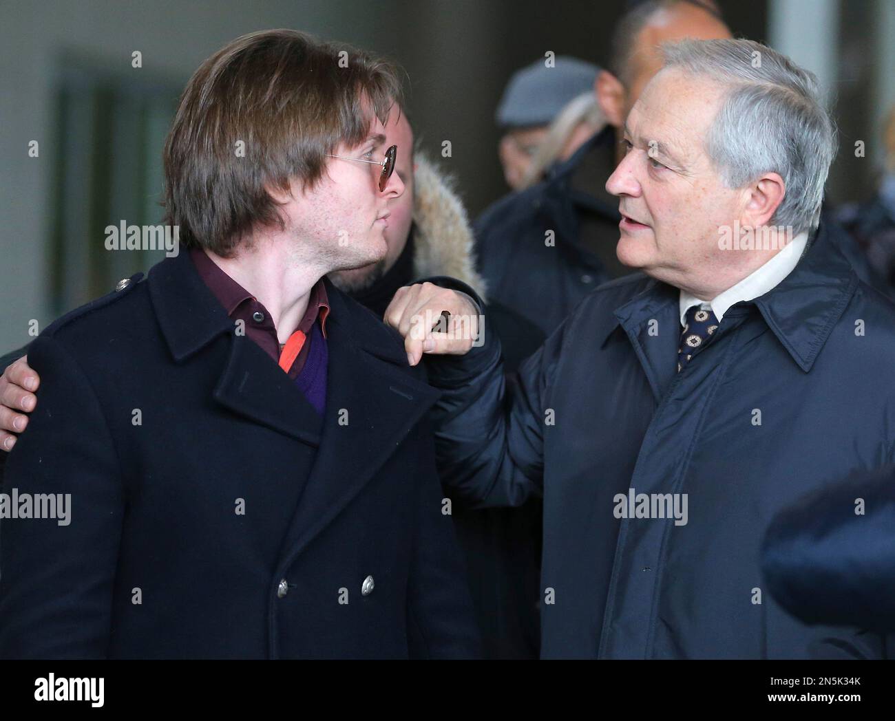 Raffaele Sollecito, left, and his father Francesco leave after ...