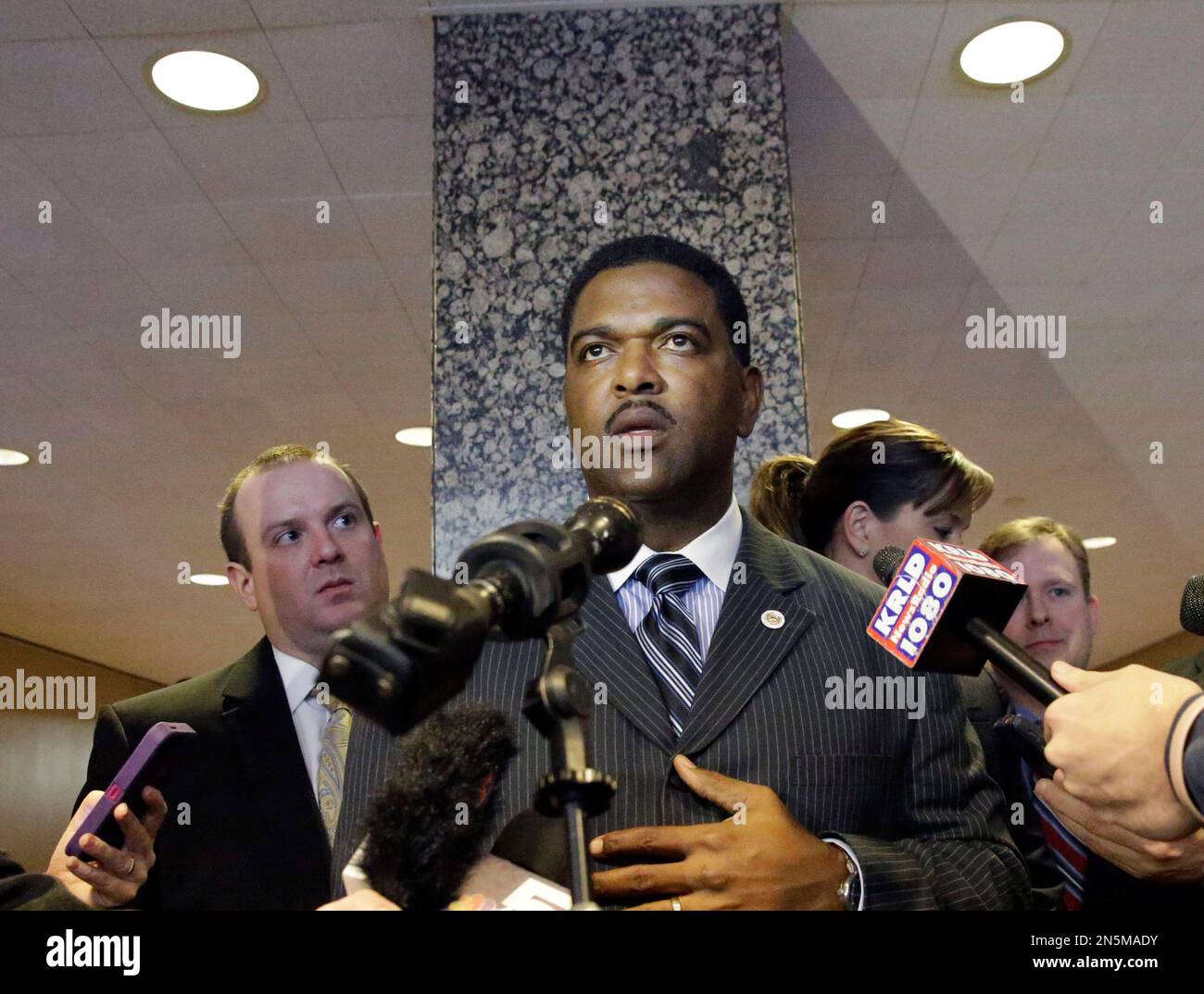 Dallas County prosecutor Heath Harris speaks to gathered reporters ...