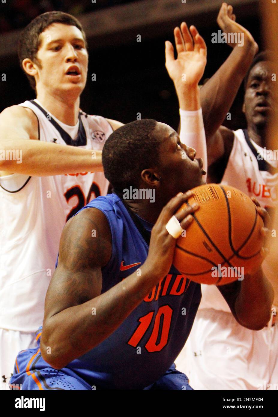 Florida forward D. Finney-Smith (10) looks to go up for two as Auburn ...