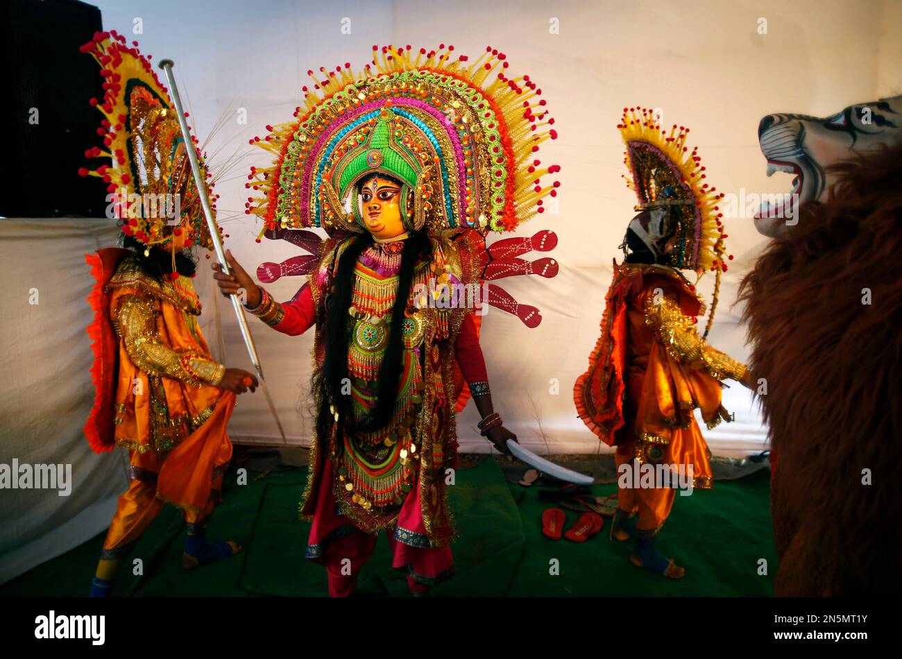 Chhau dancers from the eastern Indian state of West Bengal prepare to ...
