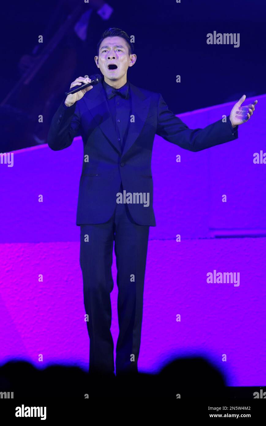Hong Kong singer-actor Andy Lau sings during a memorial concert to mark ...