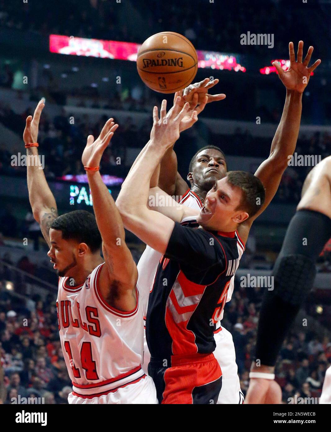 Toronto Raptors power forward Tyler Hansbrough, center, loses control ...