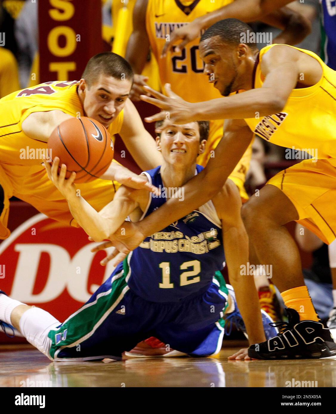 Texas A&M Corpus Christi guard Jake Kocher (12) falls and loses control ...