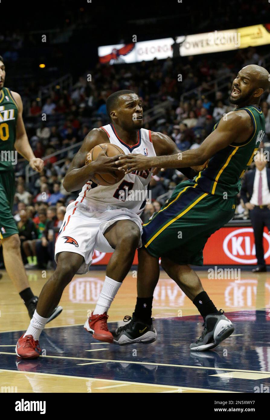 Atlanta Hawks point guard Shelvin Mack (8) drives into Utah Jazz point ...