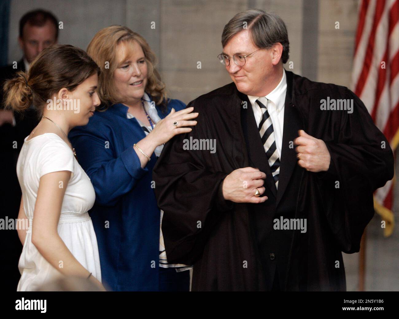 FILE - In this June 22 , 2007 file photo, Bill Koch is helped on with ...