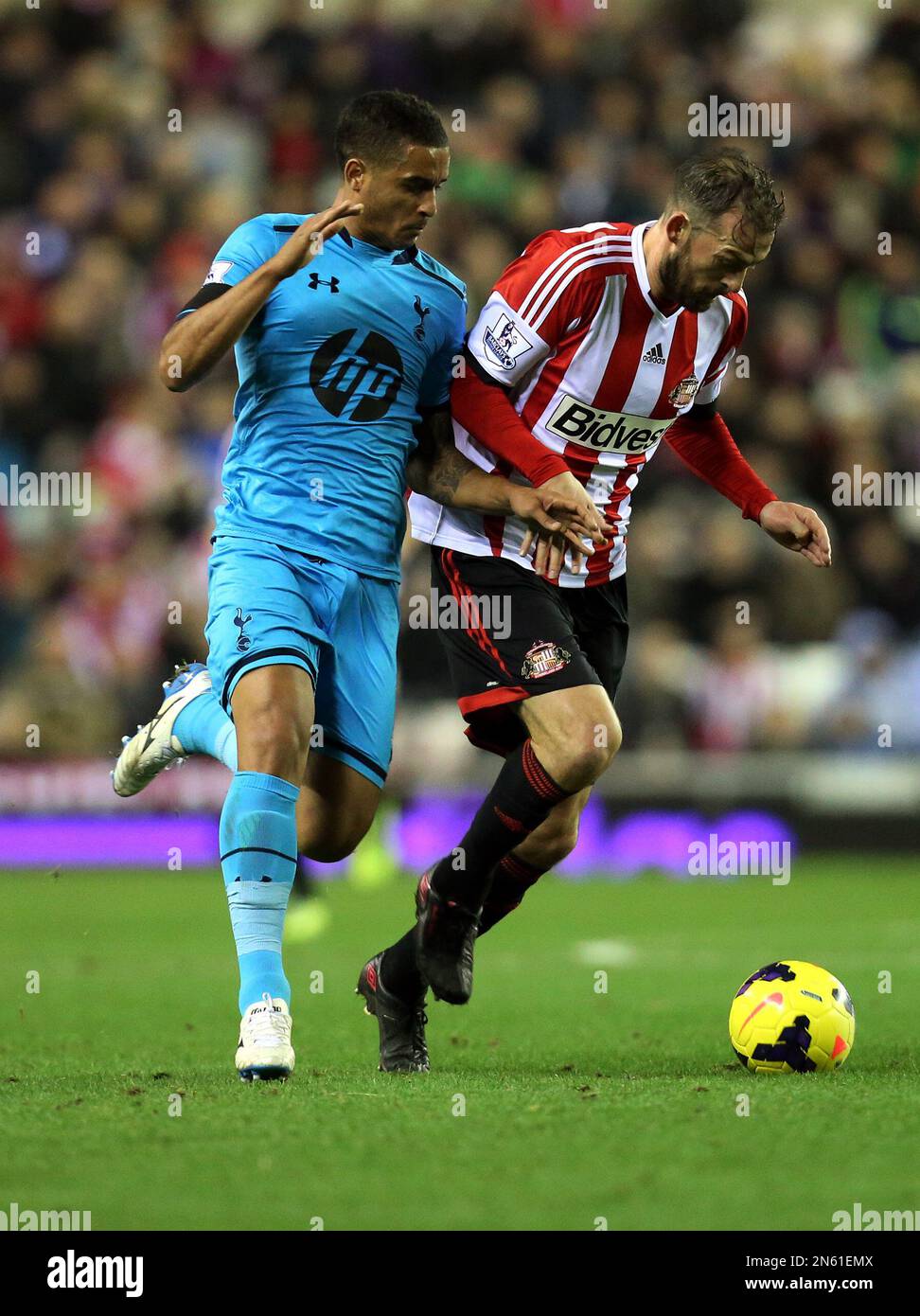 Sunderland's Steven Fletcher, right, vies for the ball with Tottenham ...