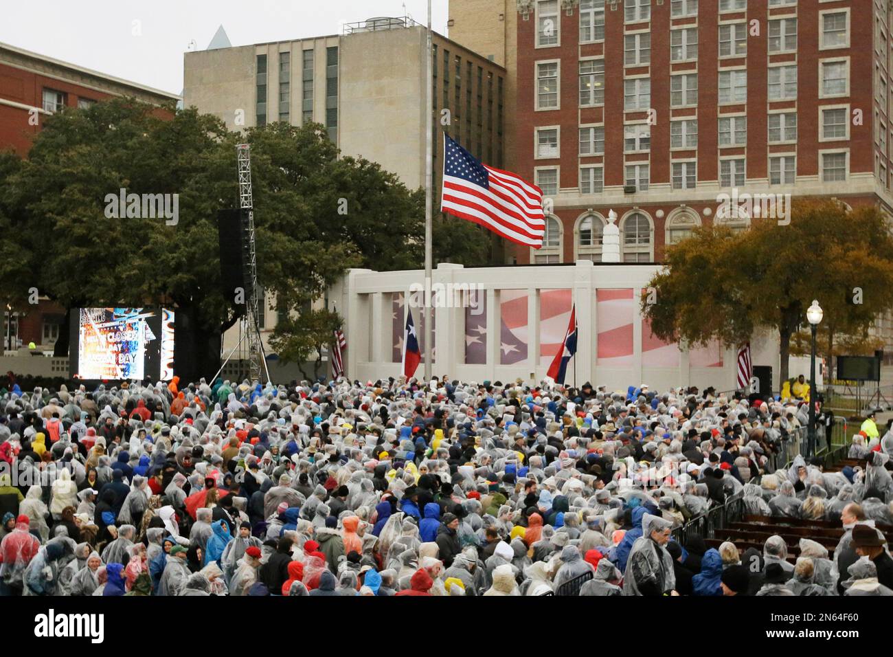 People gather before a ceremony to mark the 50th anniversary of the ...