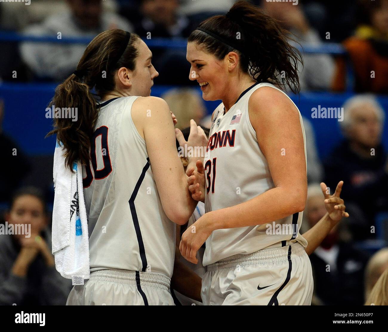 Connecticut's Stefanie Dolson, right, is greeted by teammate Breanna ...