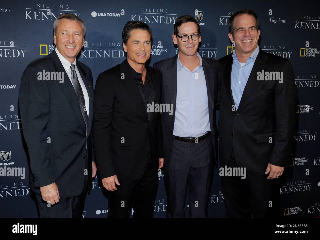 Rob Lowe, second from left, star of the film "Killing Kennedy," poses ...