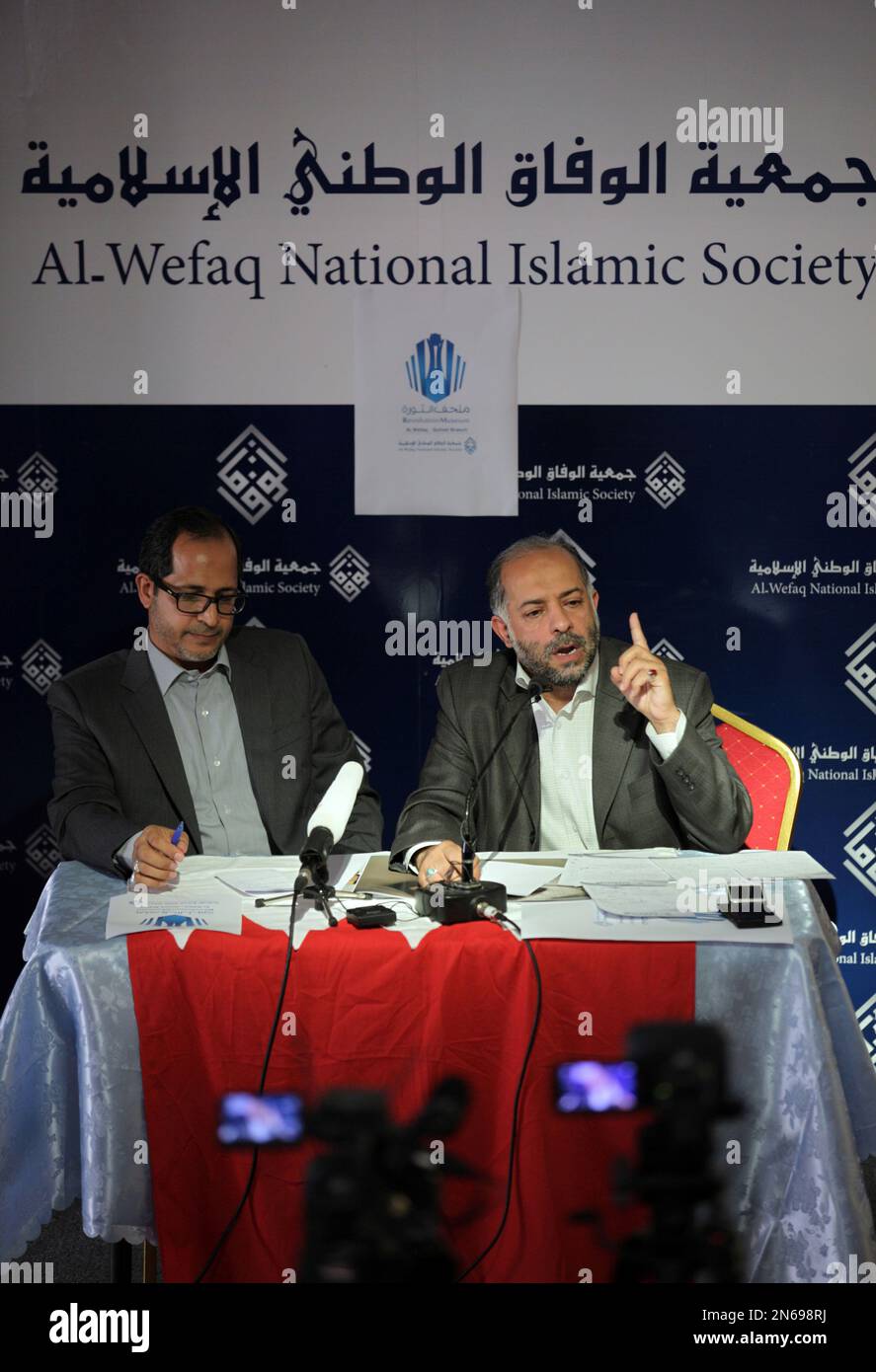 Sayed Hadi al-Musawi, right, with Majeed Milad, of the Bahraini Shiite ...