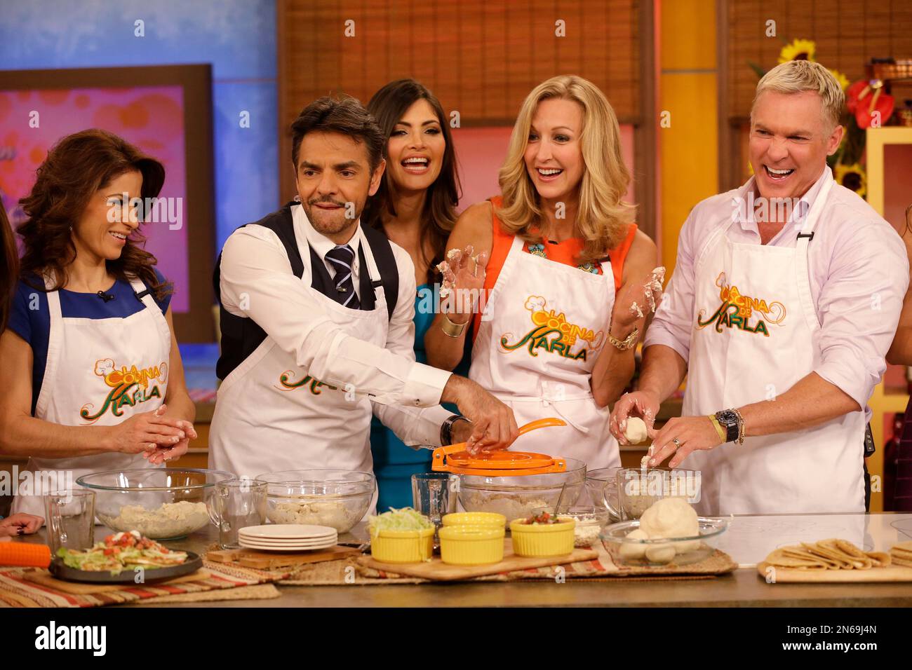 Sam Champion, right, and Lara Spencer, second from right, of the ABC ...