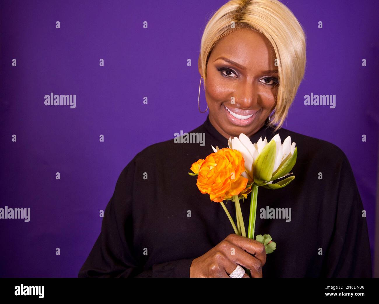 In this Monday, Sept. 16, 2013 photo, TV personality and actress NeNe ...