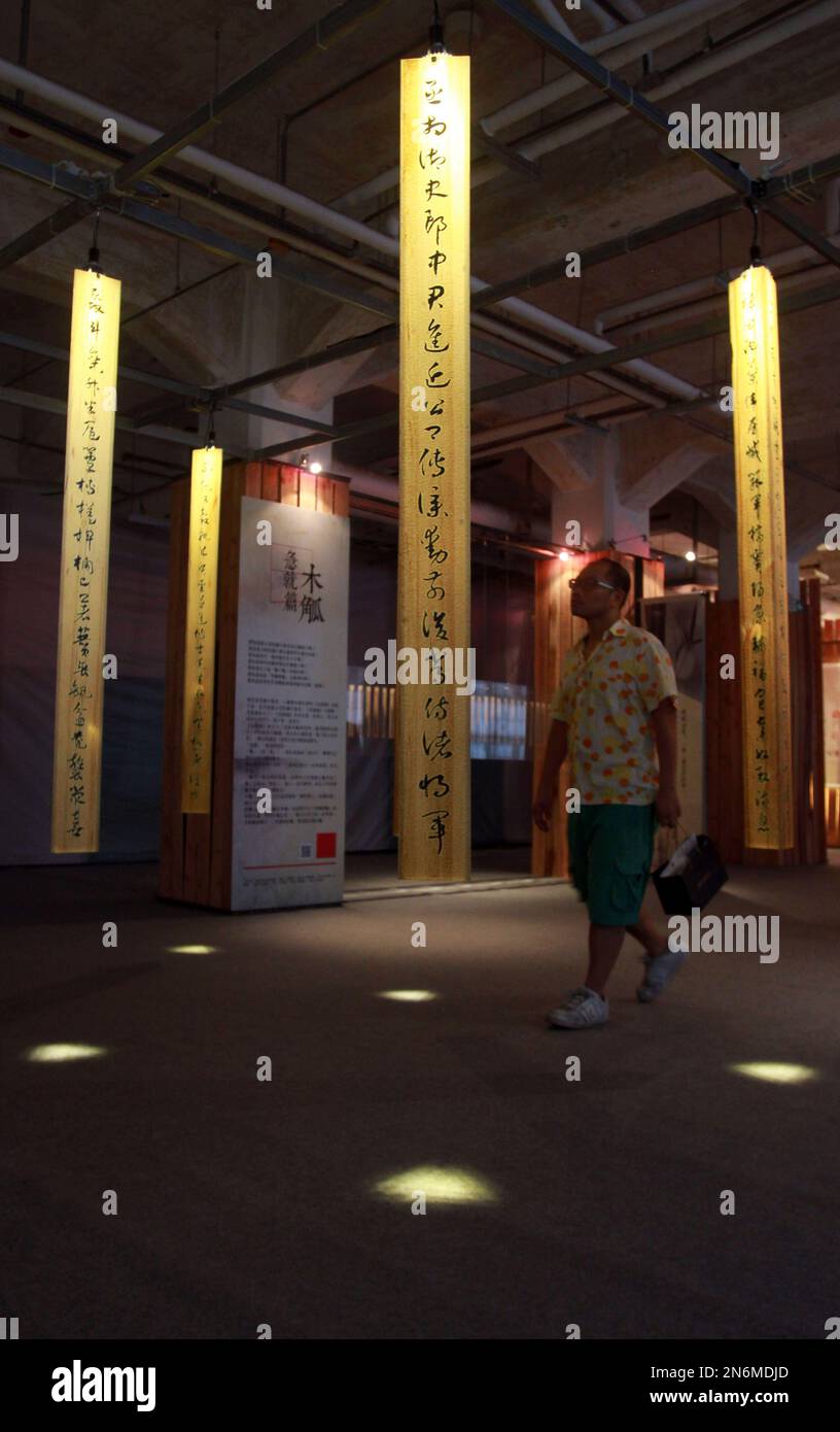 A man walks through displays during the Chinese Character Festival in ...