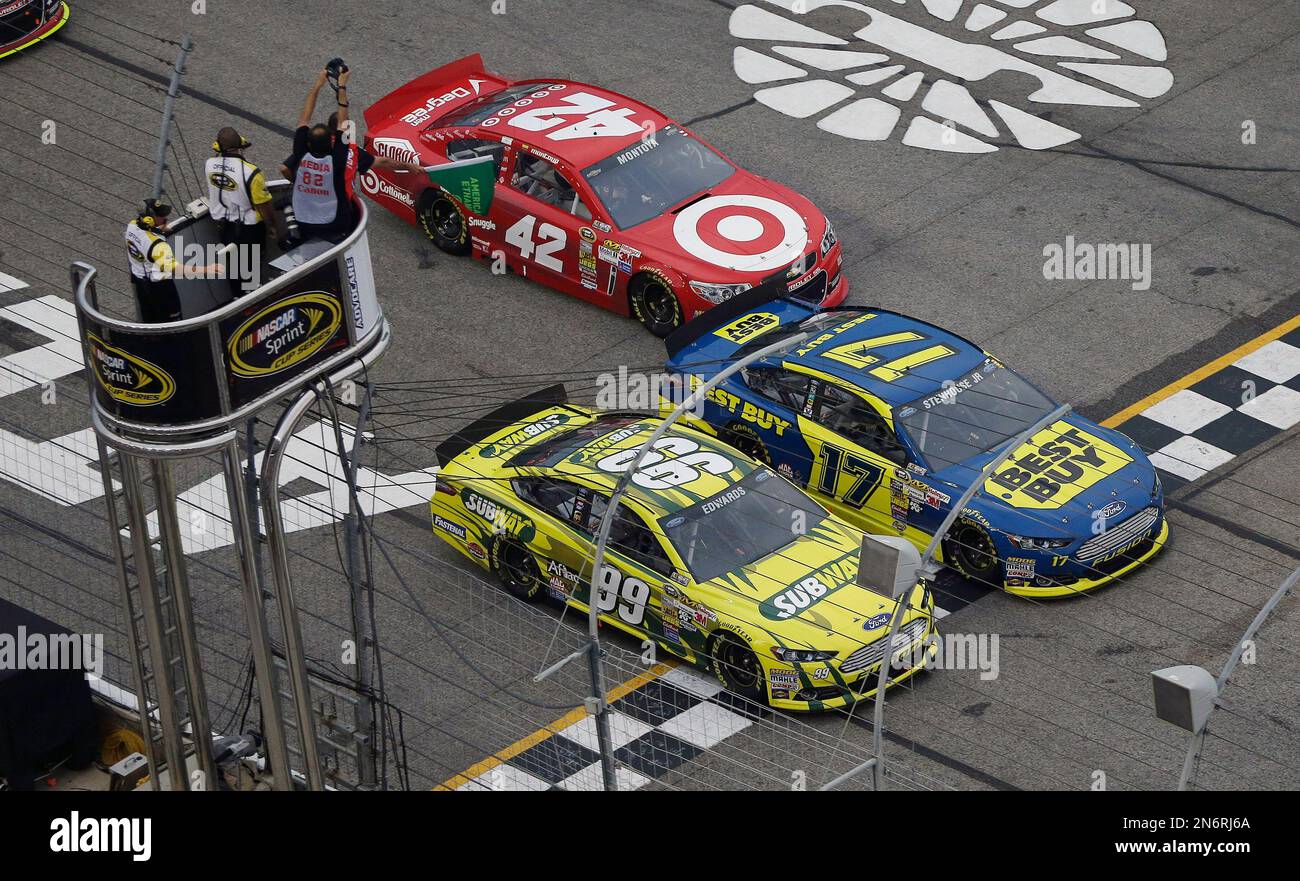 Sprint Cup Series driver Ricky Stenhouse Jr. (17) leads Carl Edwards ...