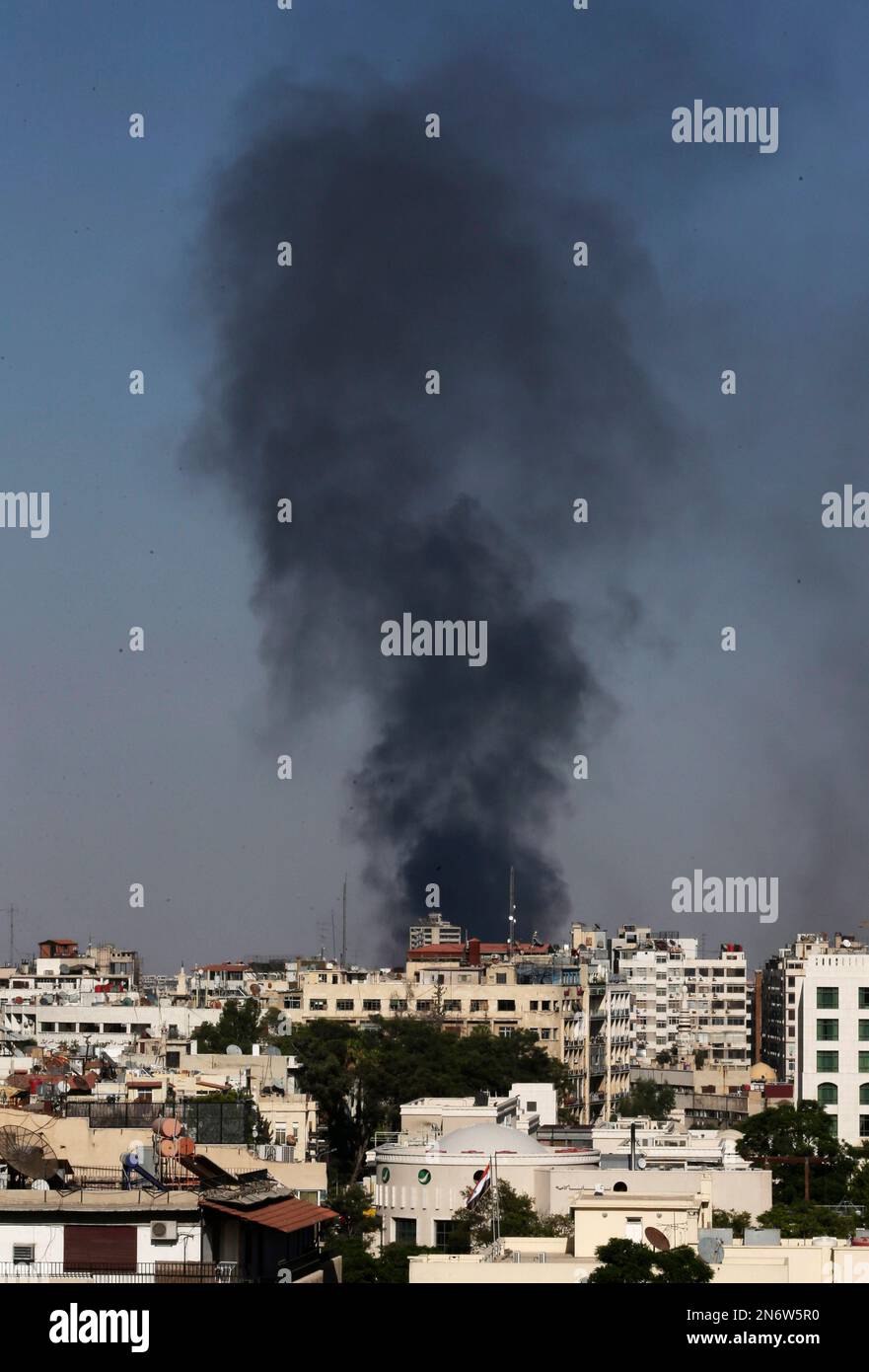 Black columns of smoke rise from heavy shelling in the Jobar ...