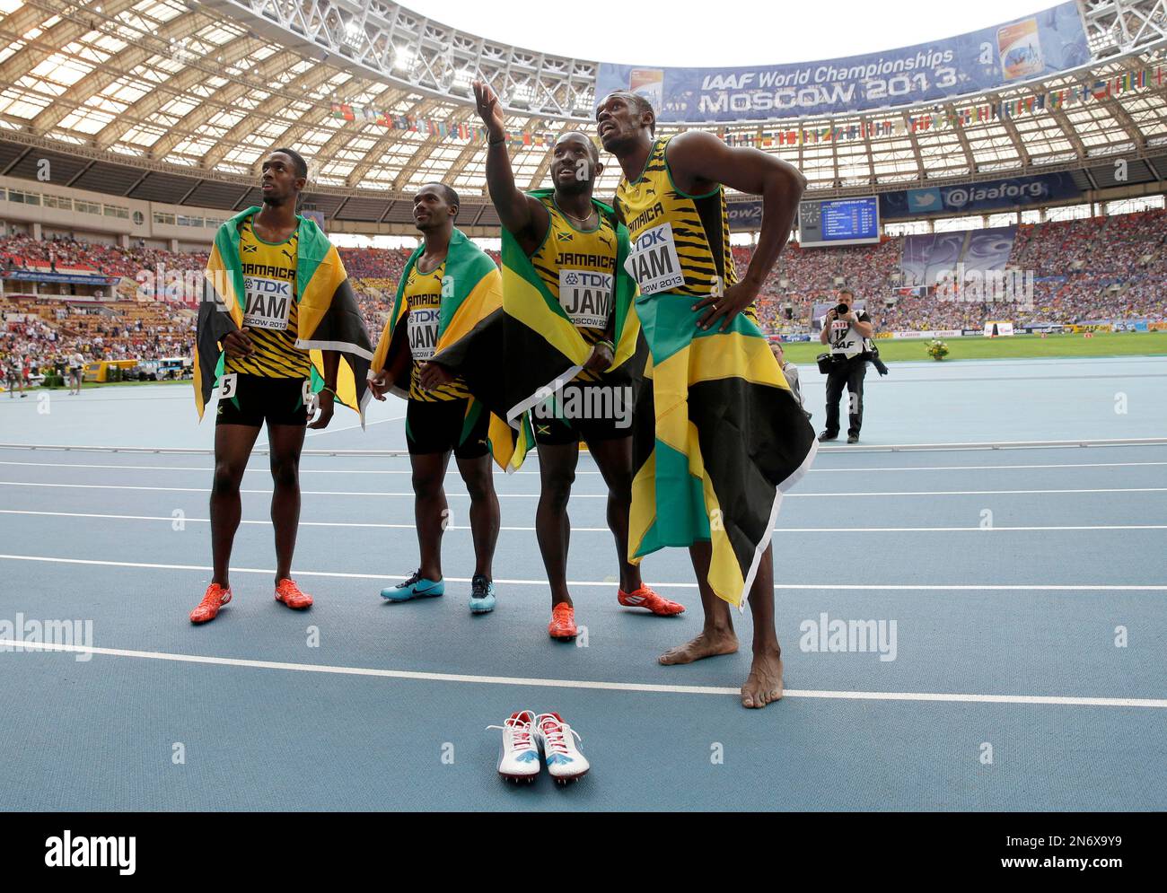 Jamaica's men's 4x100-meter relay team, from left, Kemar Bailey-Cole, Nesta Carter, Jamaica's ...