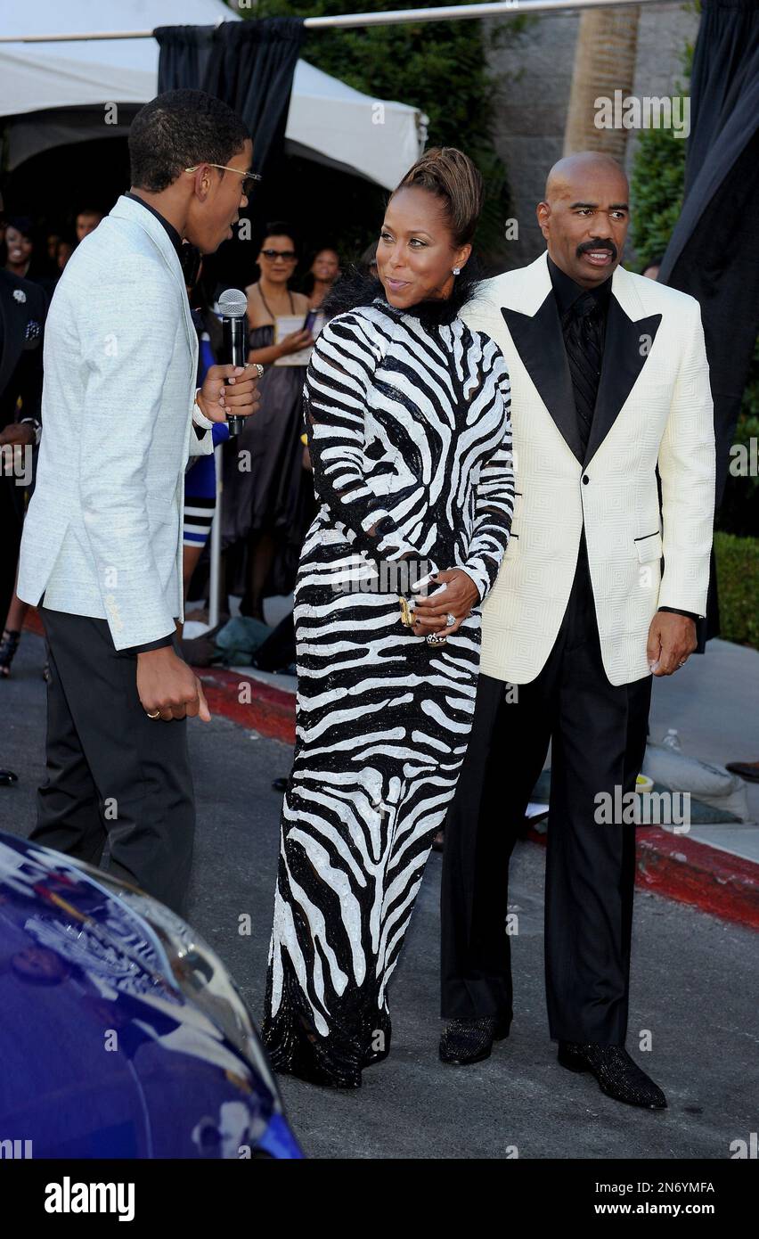 TV personality Steve Harvey, right, and wife Marjorie Bridges arrive at ...