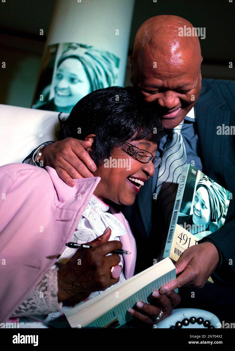 Winnie Madikizela-Mandela, left, reacts with Justice Minister Jeff ...