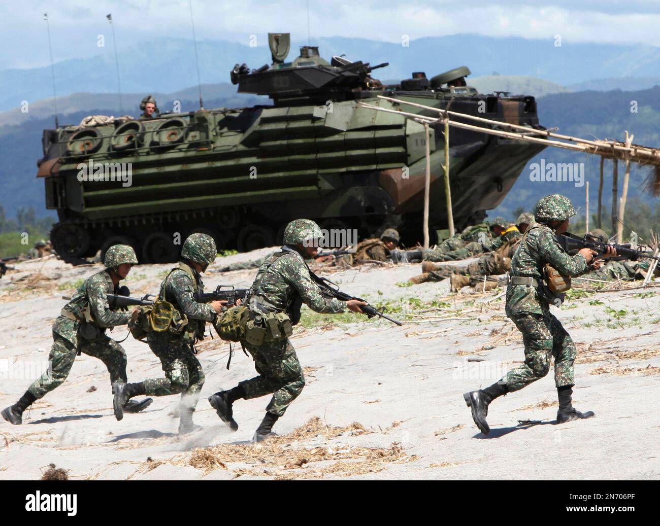FILE--In this Oct. 23, 2011 file photo, Philippine marines storm the ...
