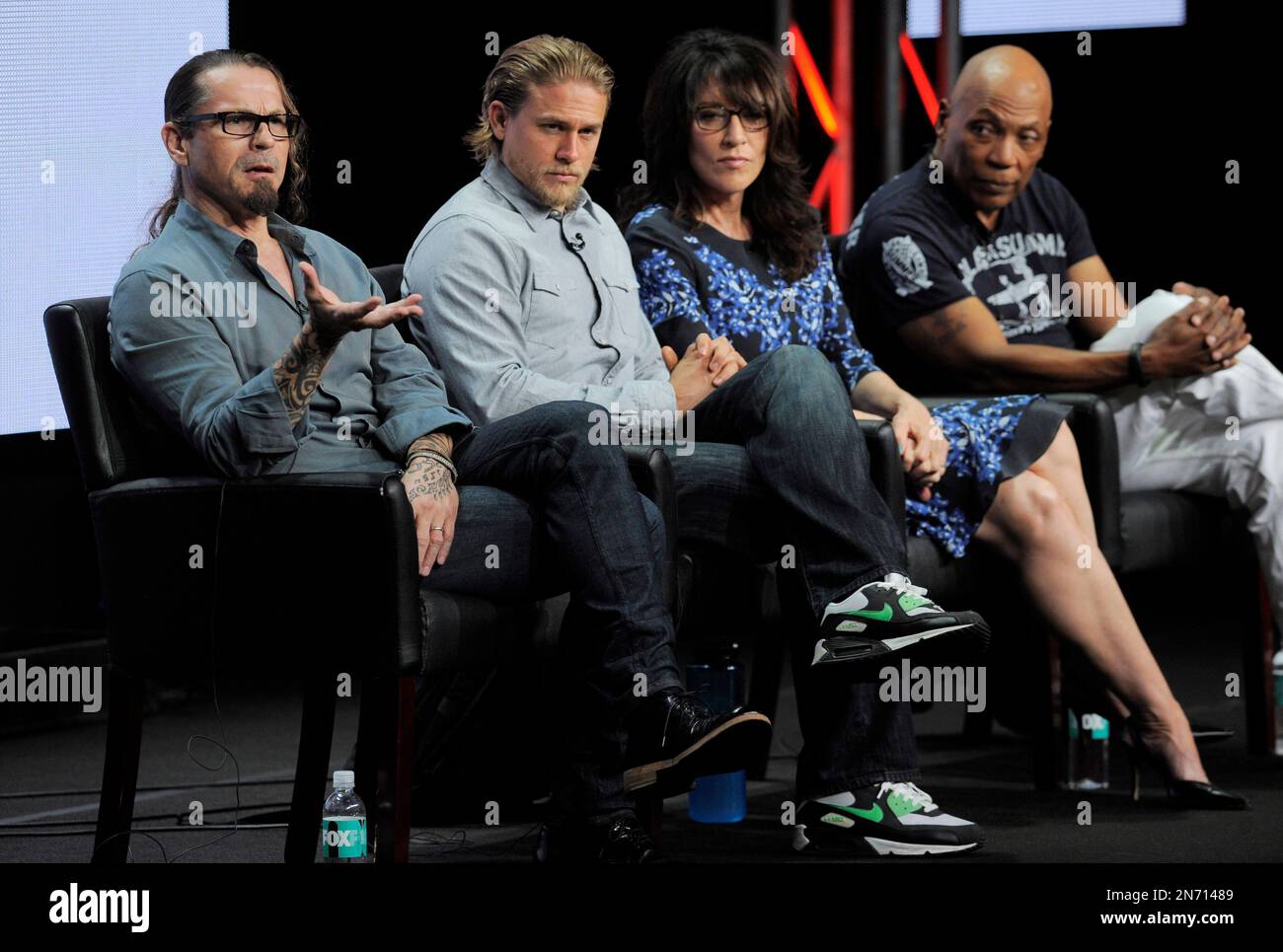 Kurt Sutter, left, creator/executive producer of the FX series "Sons of Anarchy," takes part in ...