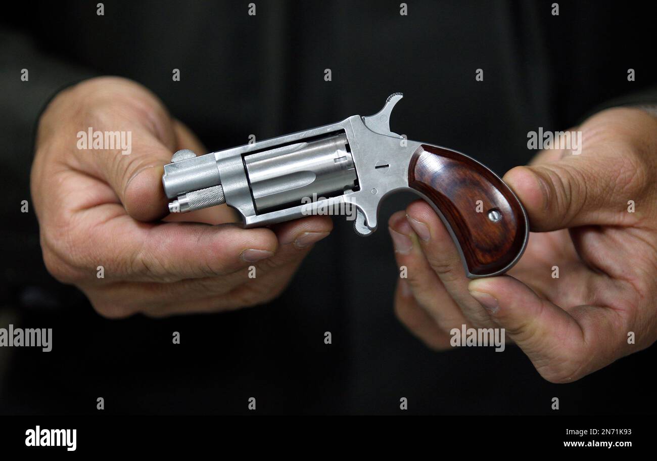 In this July 26, 2013 photo, a police officer shows a North American ...