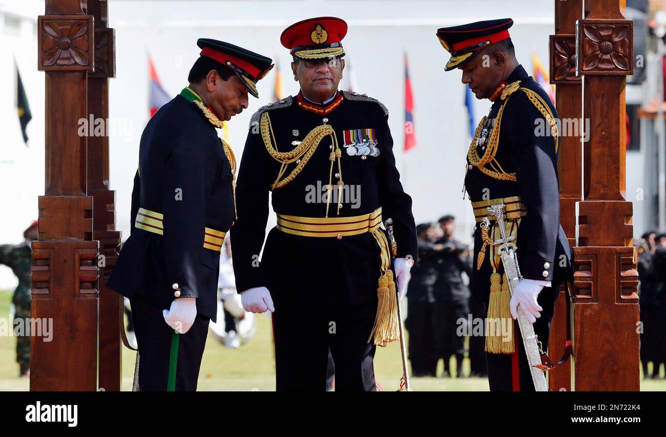 Sri Lankan army commander Lt. Gen. Jagath Jayasuriya, center, attends a ...