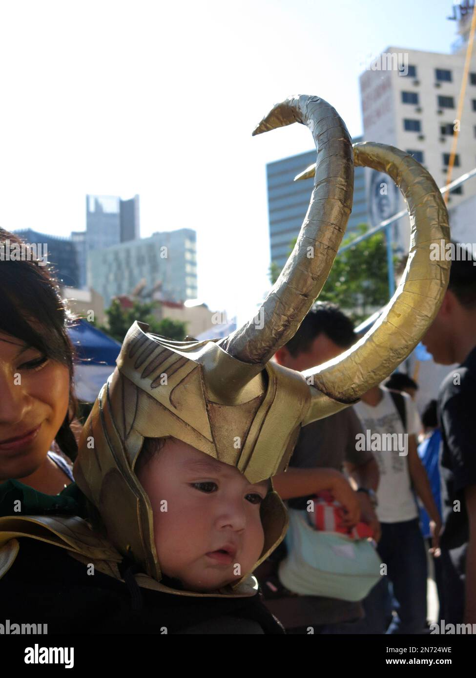 In this July 27, 2013 photo, Mariana Abarca, 26, carries her son ...