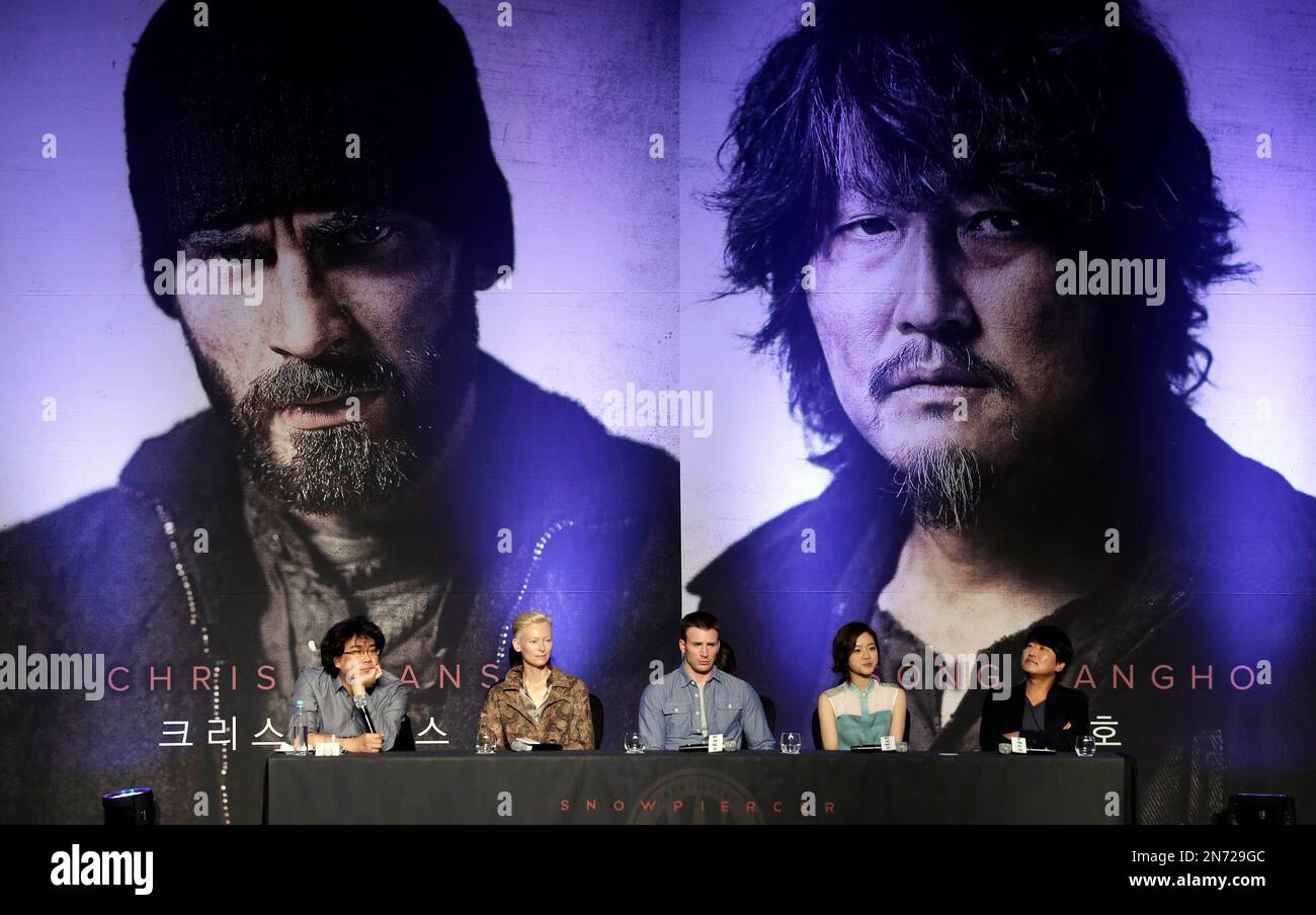 New film "Snowpiercer" director Bong Joon-Ho, left, and actors, from ...